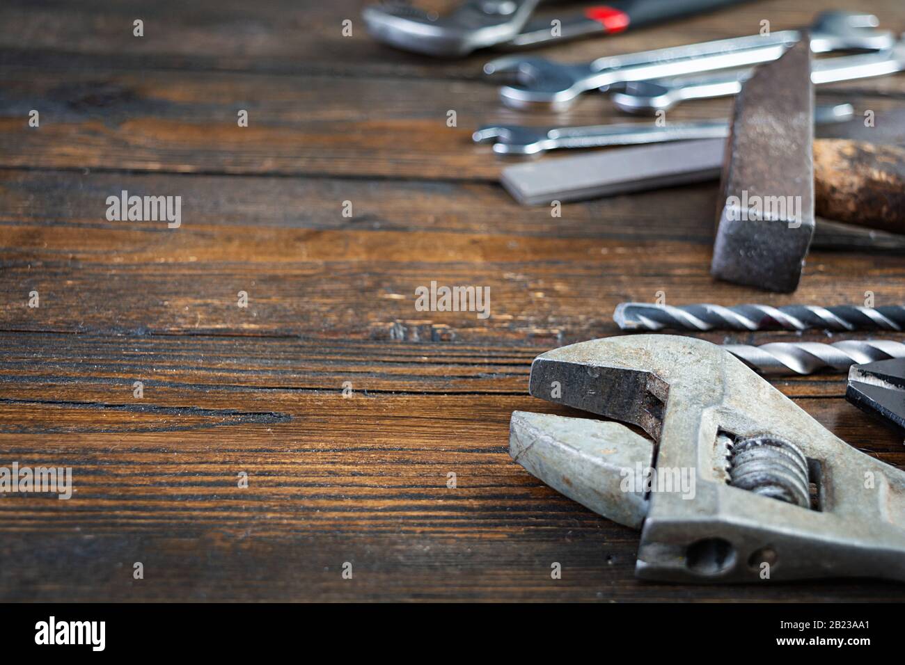 Set of working tools on wooden rustic background Stock Photo - Alamy