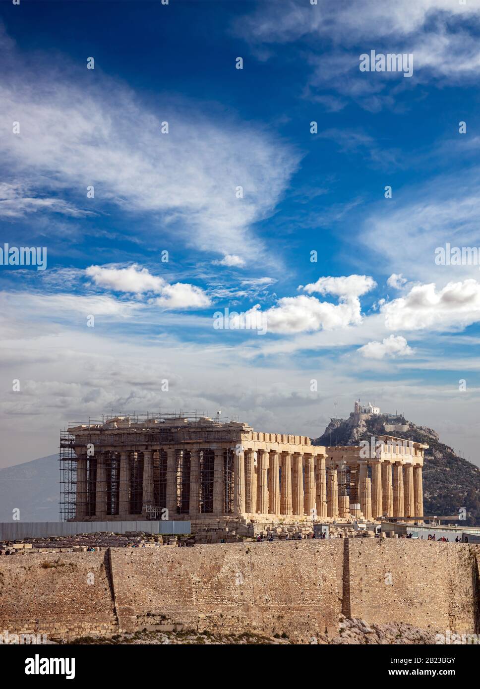 Athens, Greece. Acropolis Parthenon temple seen from Philopappos Hill, blue cloudy sky ...
