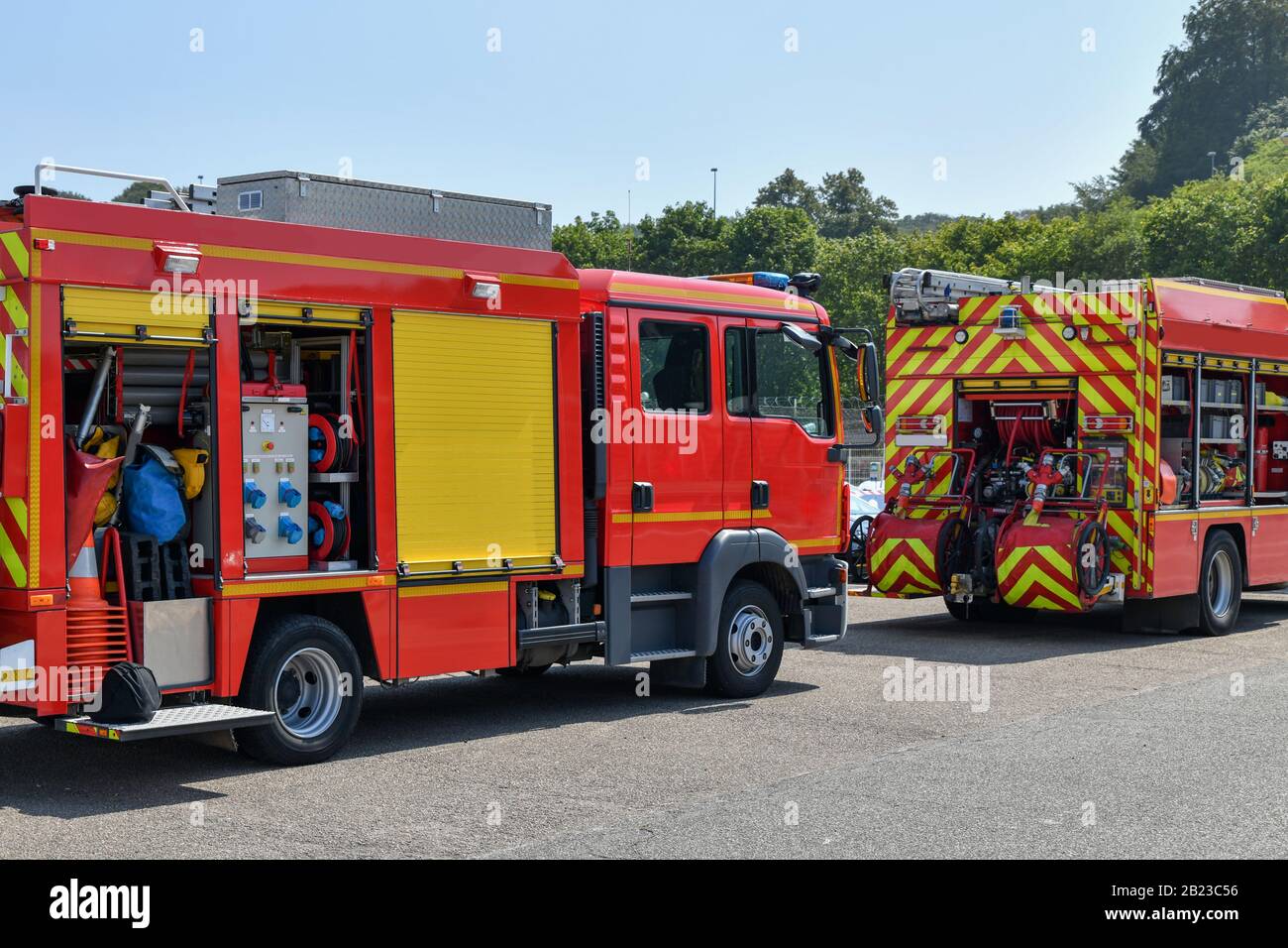 Big red fire truck with fire equipment Stock Photo - Alamy