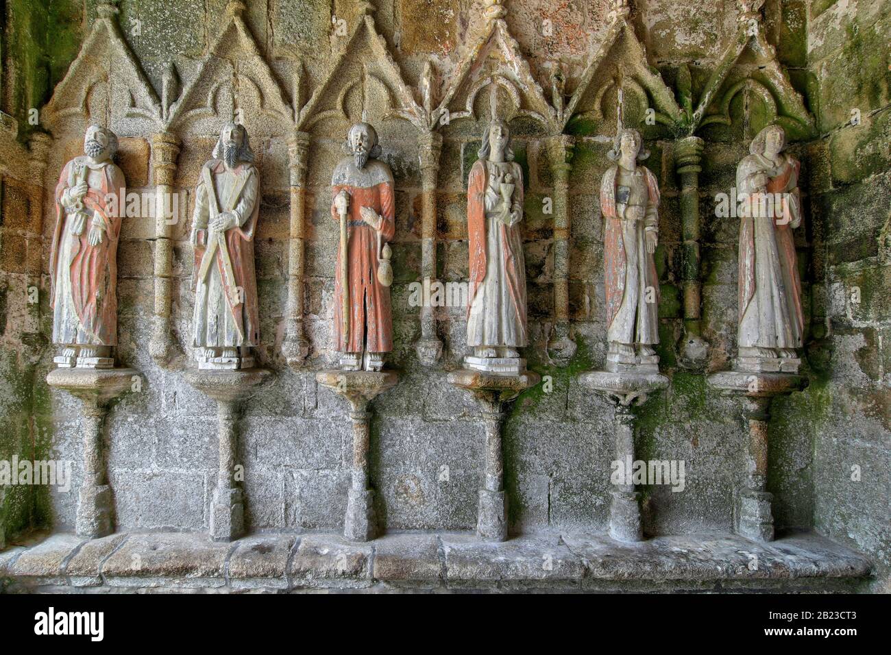 Medieval wooden statues of saints - apostles - at the entrance to the ...