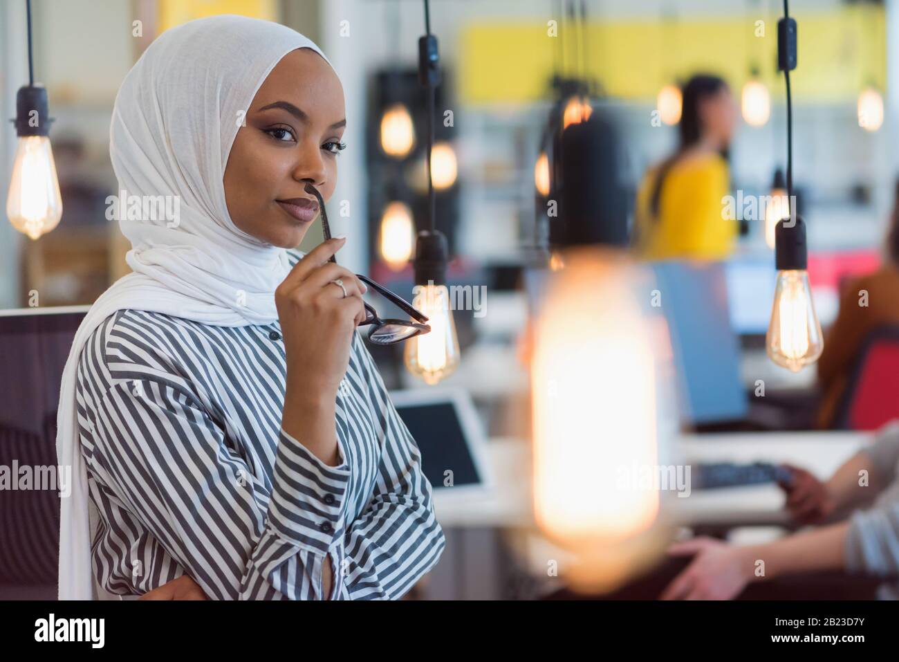 Young muslim African American business woman as a leader at work ...
