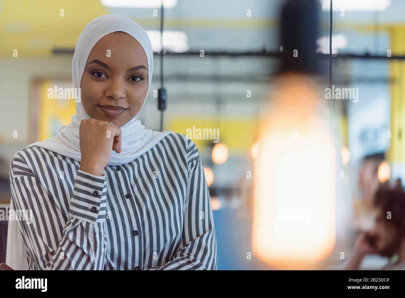 Young muslim African American business woman as a leader at work ...