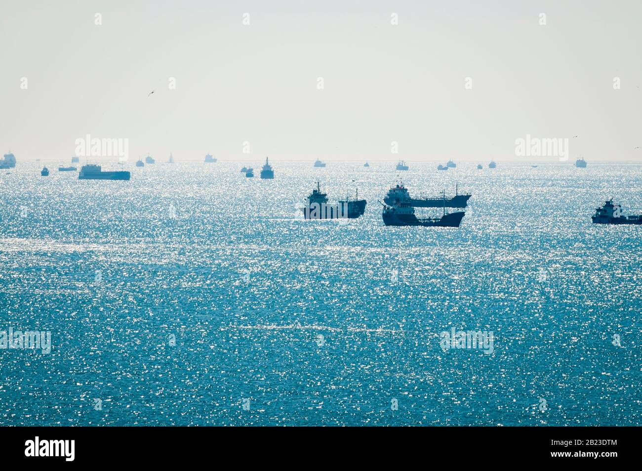Offshore view of traffic jam of tanker ships crowding the horizon on ...
