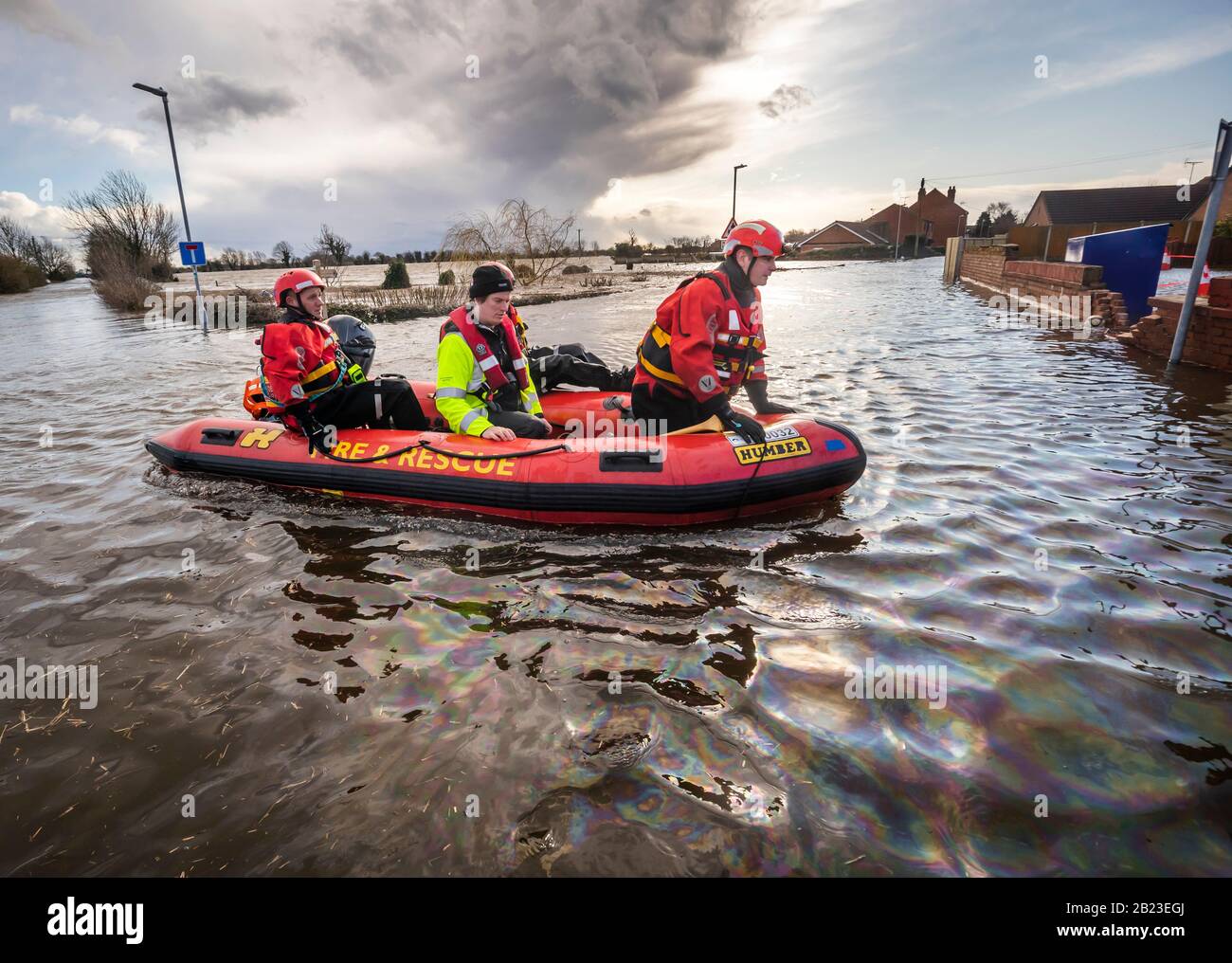 Rescue workers in the flooded village of east cowick hi-res stock ...