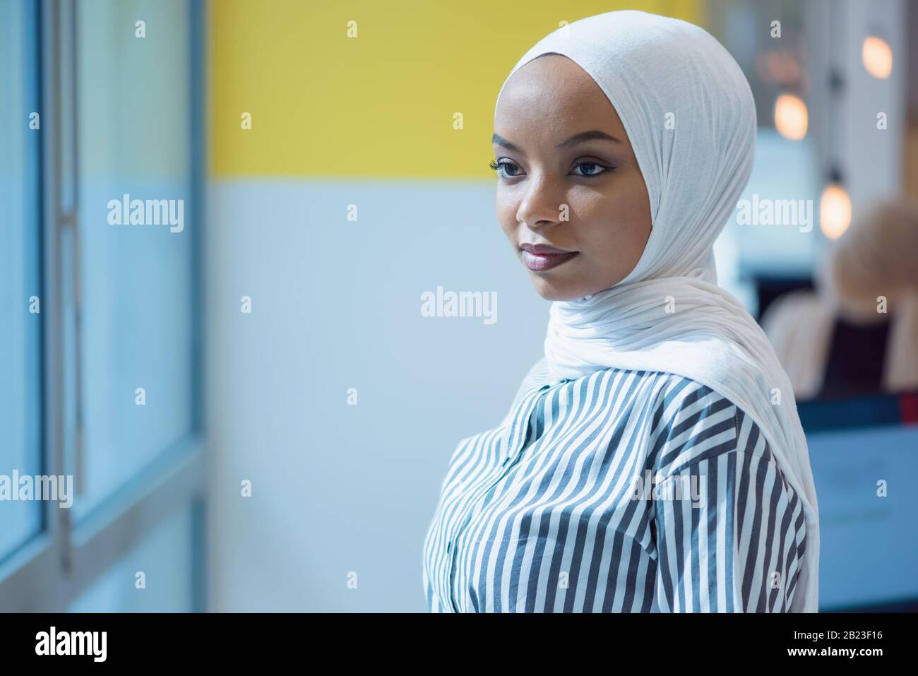 Young muslim African American business woman as a leader at work ...