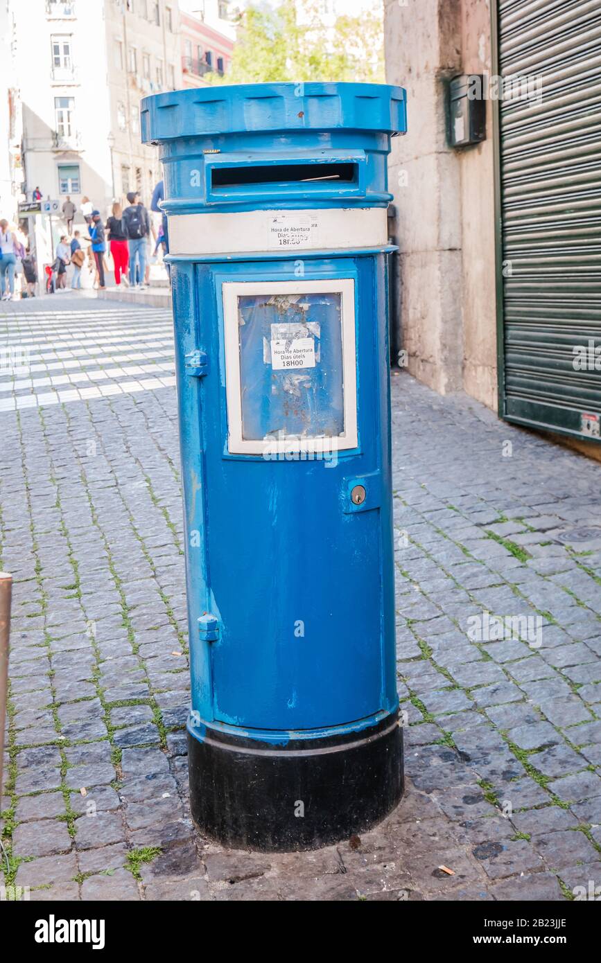 a blue post box in lisbon portugal Stock Photo - Alamy