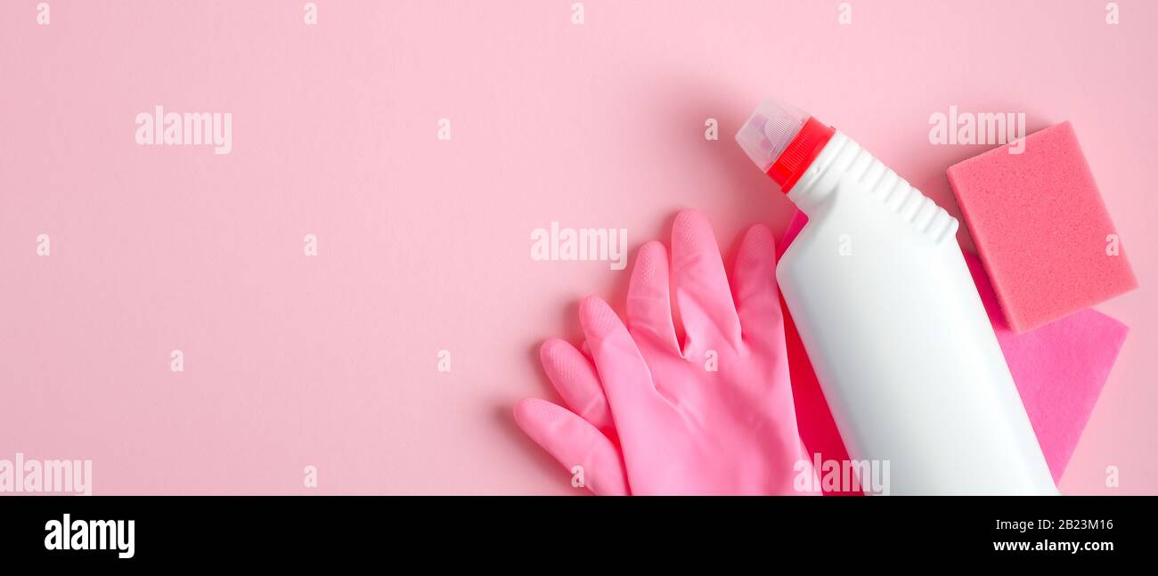 Cleaning supplies on pink background. House cleaning service and ...