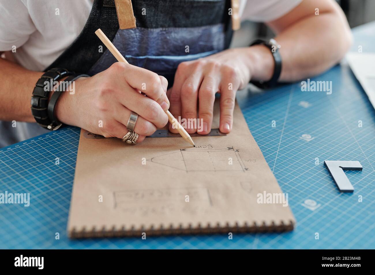 Craftsman making sketch working place hi-res stock photography and ...