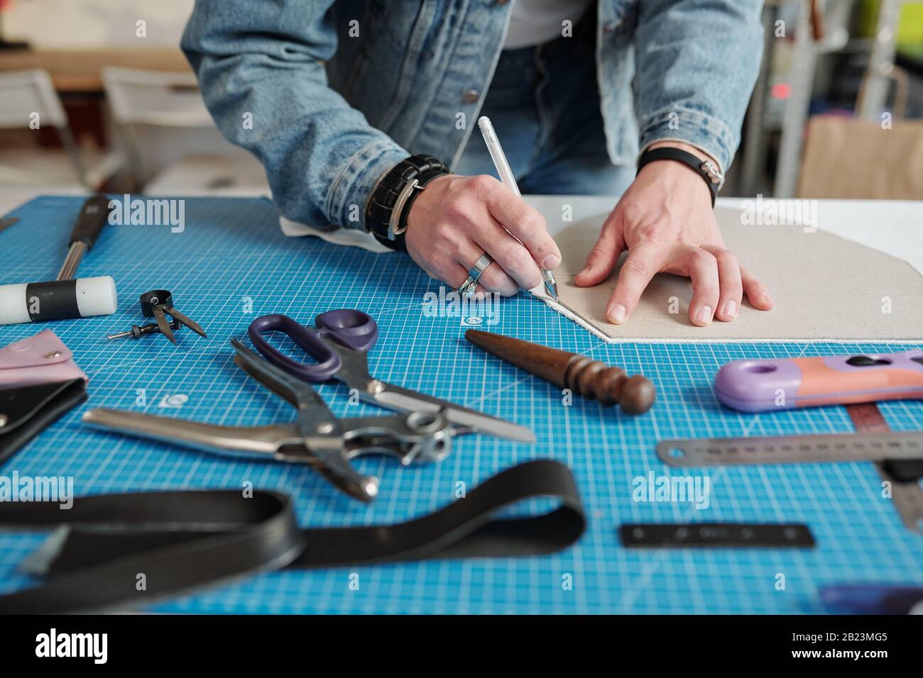 Bending over table hi-res stock photography and images - Alamy