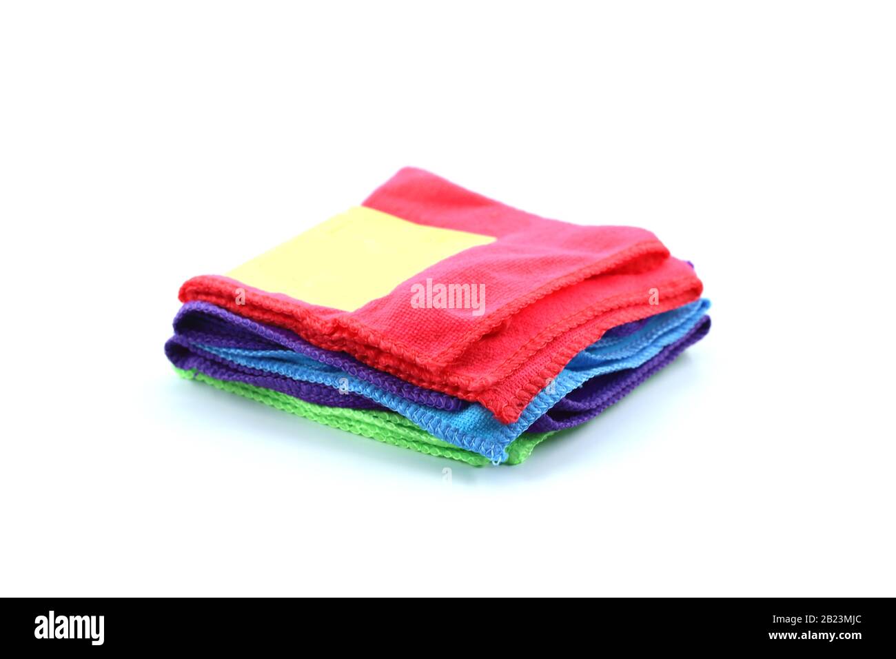 Stack of colorful rags isolated on white Stock Photo - Alamy