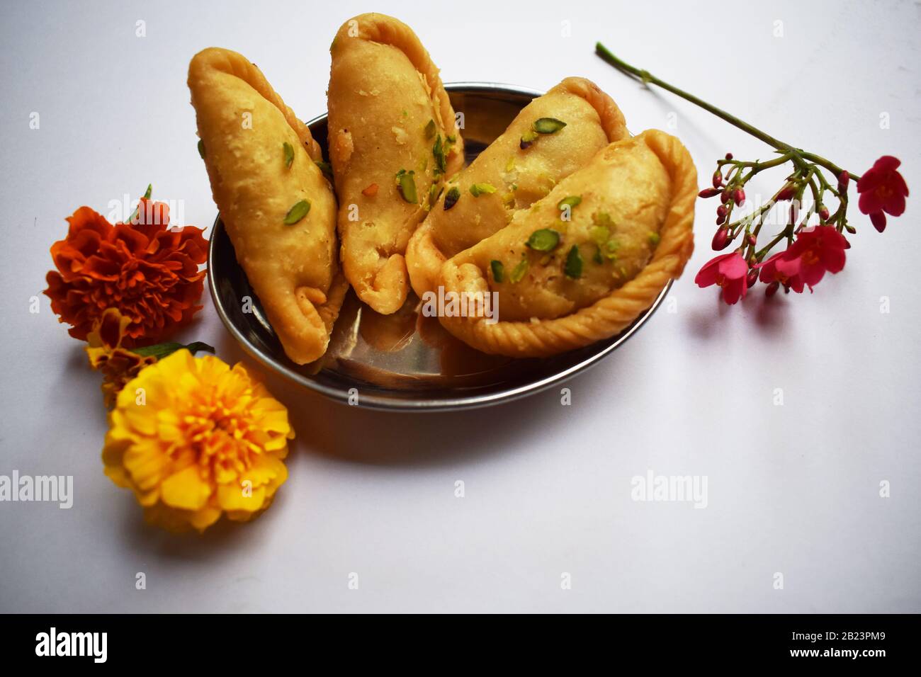 Gujia or Ghugra is a sweet dish from Indian subcontinent served during ...