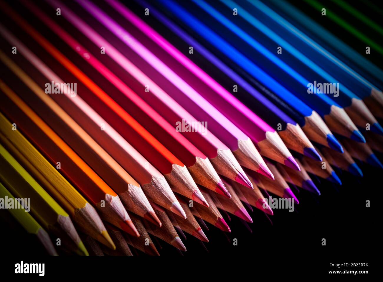colored pencils on black background Stock Photo - Alamy