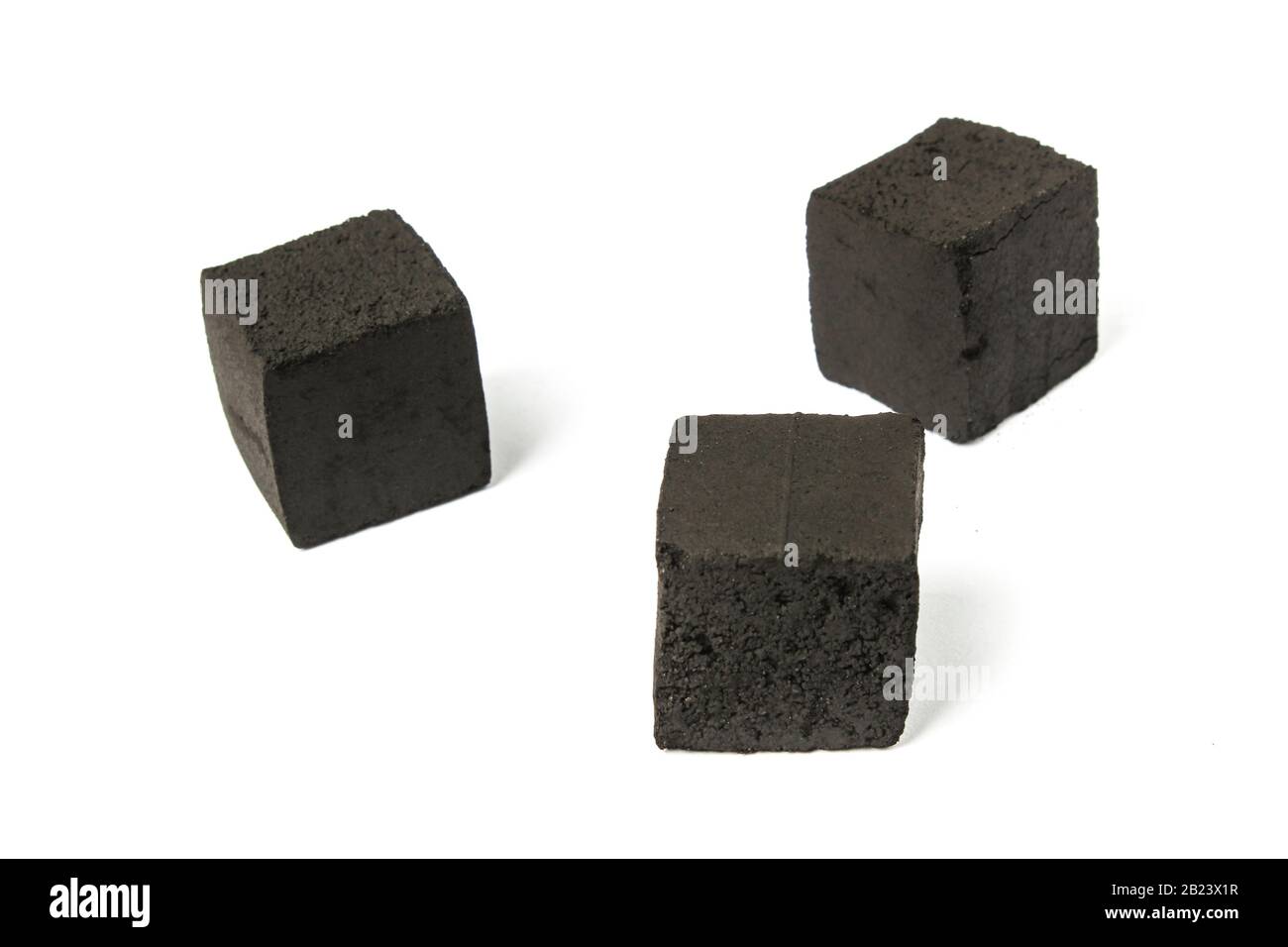 Cubes of coal for hookah isolated on white Stock Photo - Alamy