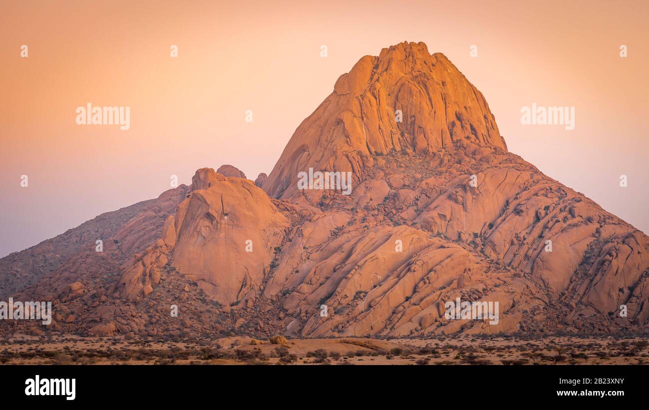 The Spitzkoppe mountain at sunrise in Namibia Stock Photo - Alamy