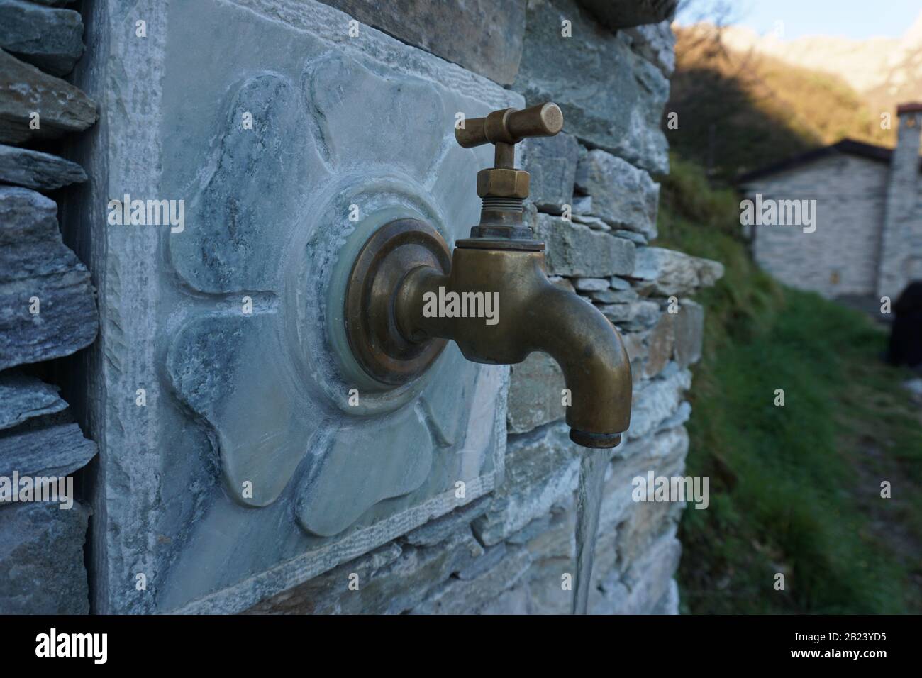 Brass spout fountain hi-res stock photography and images - Alamy