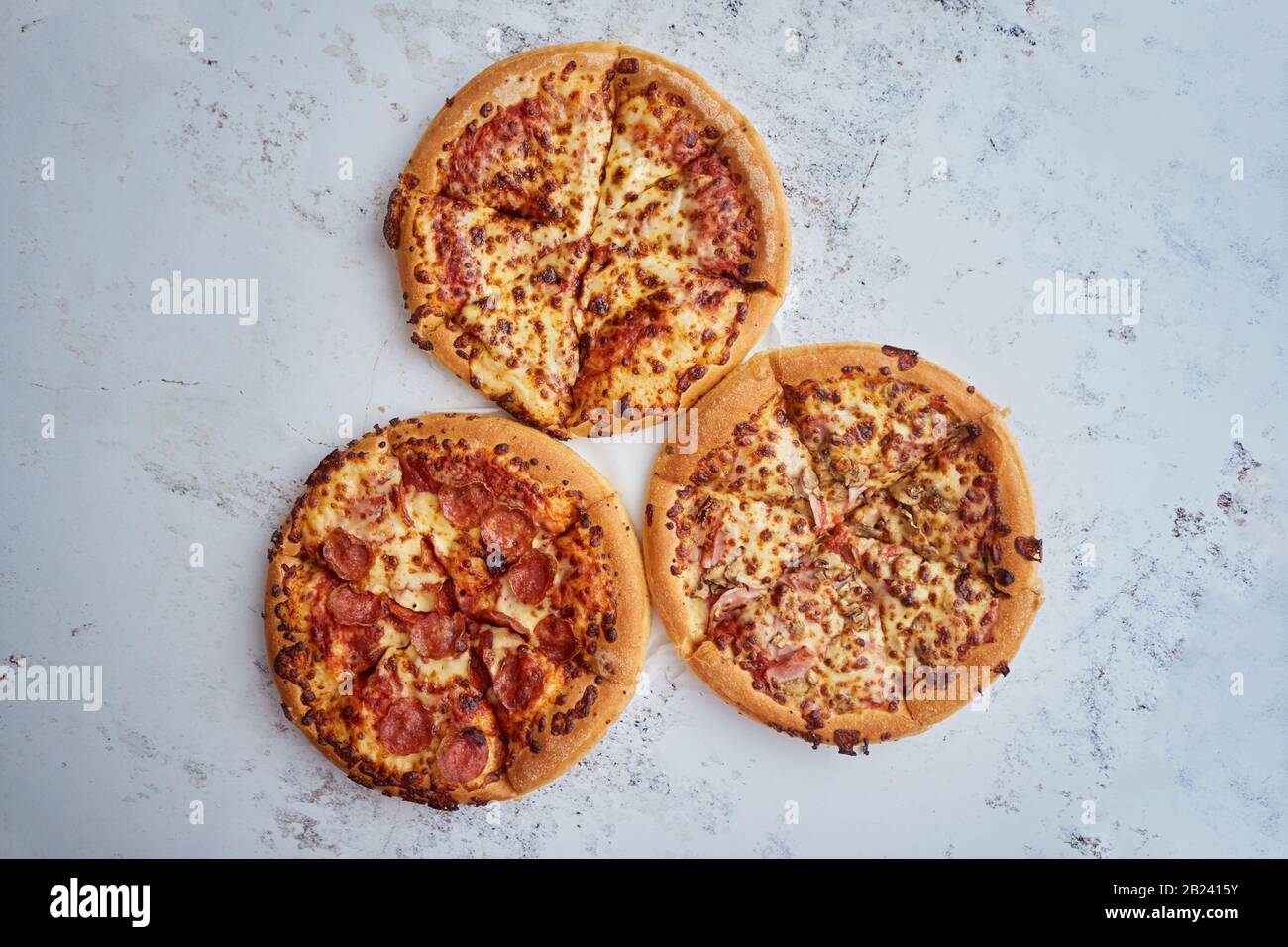 Three cheese pizzas hi-res stock photography and images - Alamy
