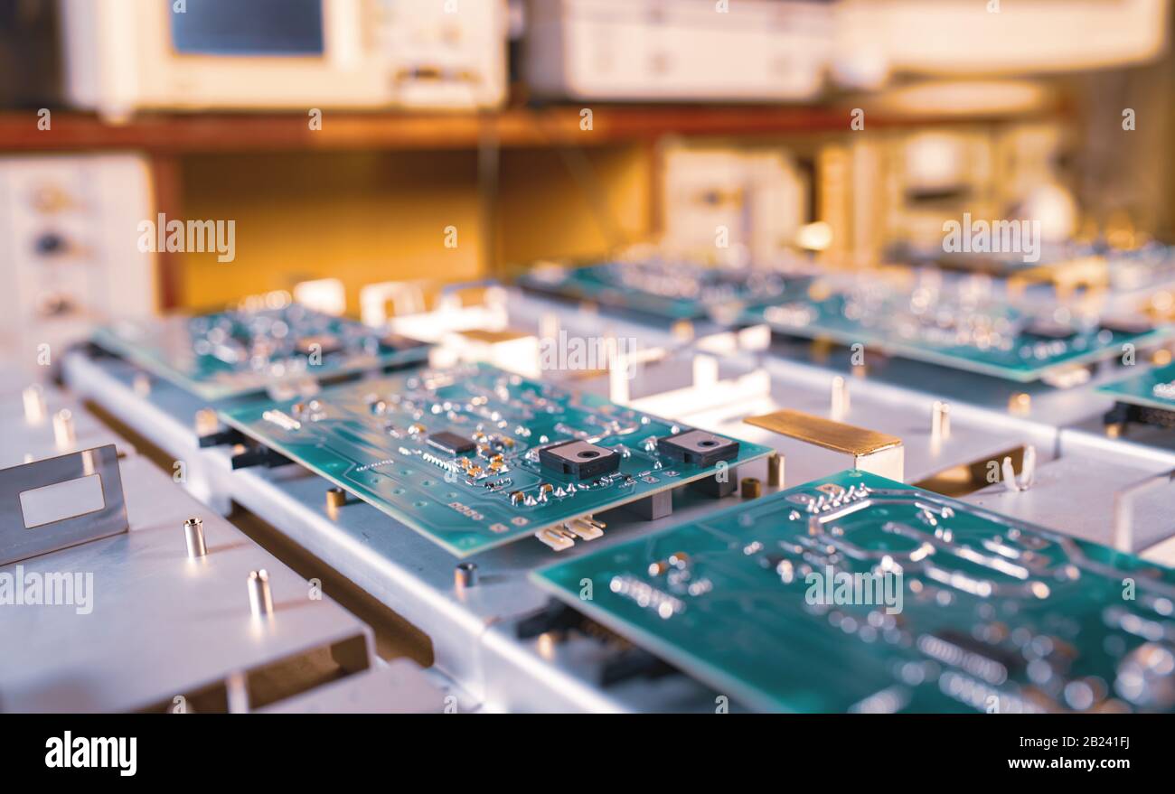 Close-up computer green microcircuits lie row after row in the ...