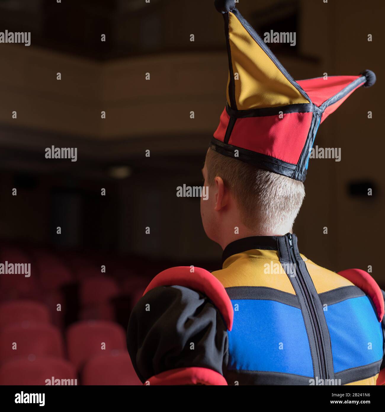 Actor dressed jester's costume in interior of old theater Stock Photo ...