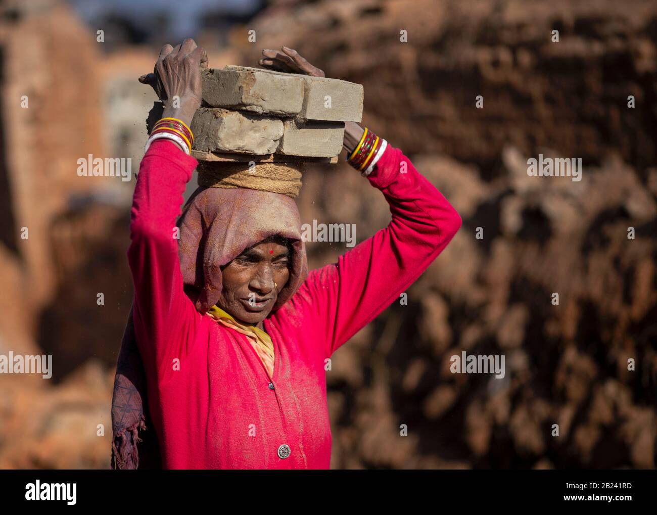 Labourer carrying hi-res stock photography and images - Alamy