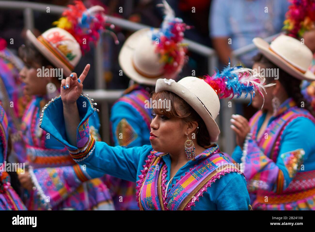 Traditional folk dancers performing as they parade through the mining city of Oruro on the ...