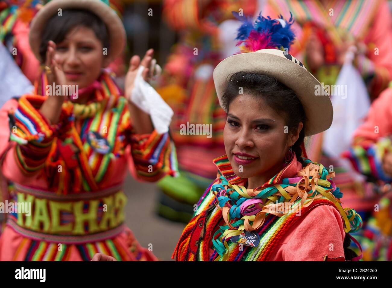 Traditional folk dancers performing as they parade through the mining ...