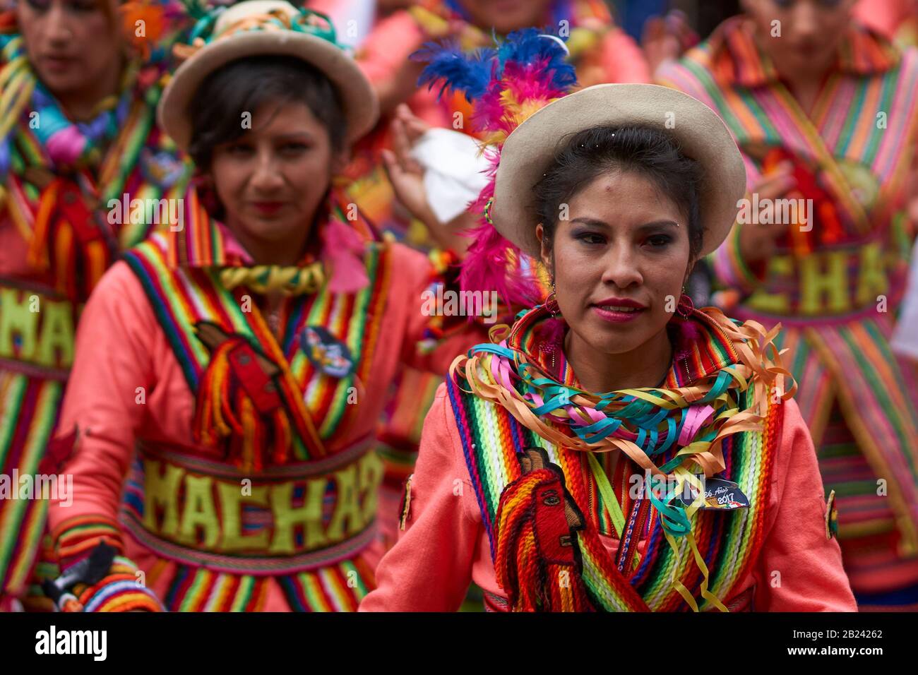 Traditional folk dancers performing as they parade through the mining ...
