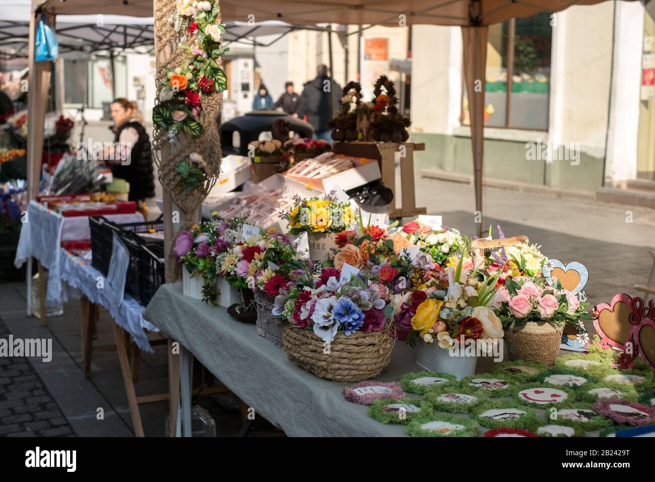 Sibiu city, Romania - February 29, 2020. People look at martisor at big ...