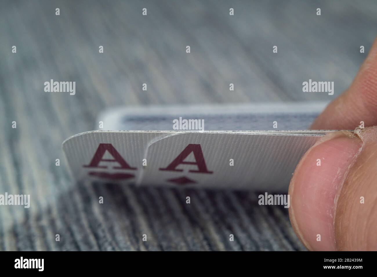 Poker hand three of kind cards hi-res stock photography and images - Alamy