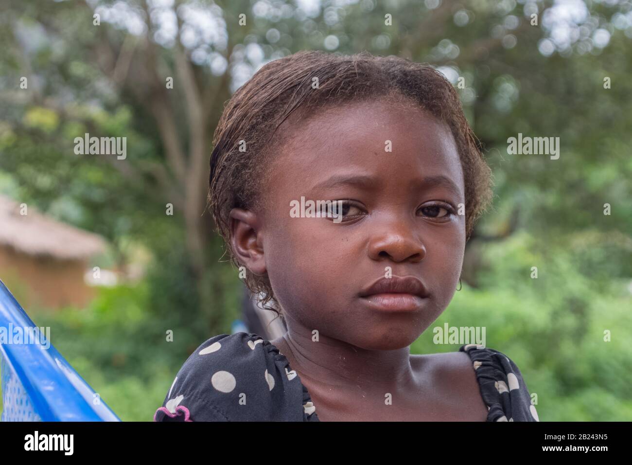 Sumbe / Angola - 02 25 2020: View of a portrait of an African girl ...