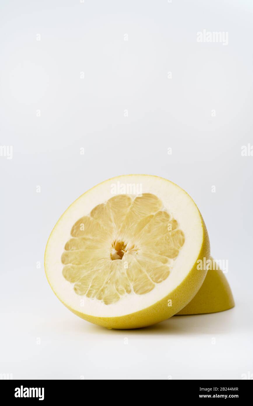 Sliced yellow pomelo on white background, high resolution Stock Photo ...
