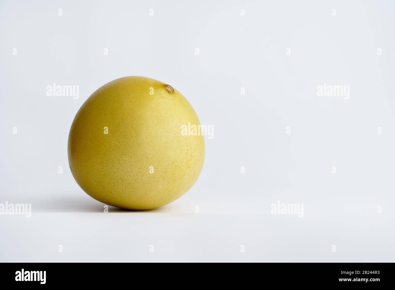 Yellow pomelo on white background, high resolution Stock Photo - Alamy