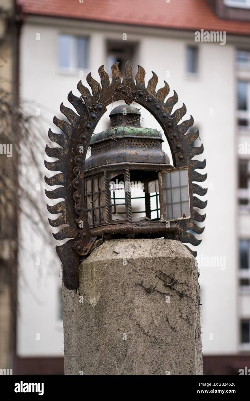 Old damaged metal street lamp Stock Photo - Alamy