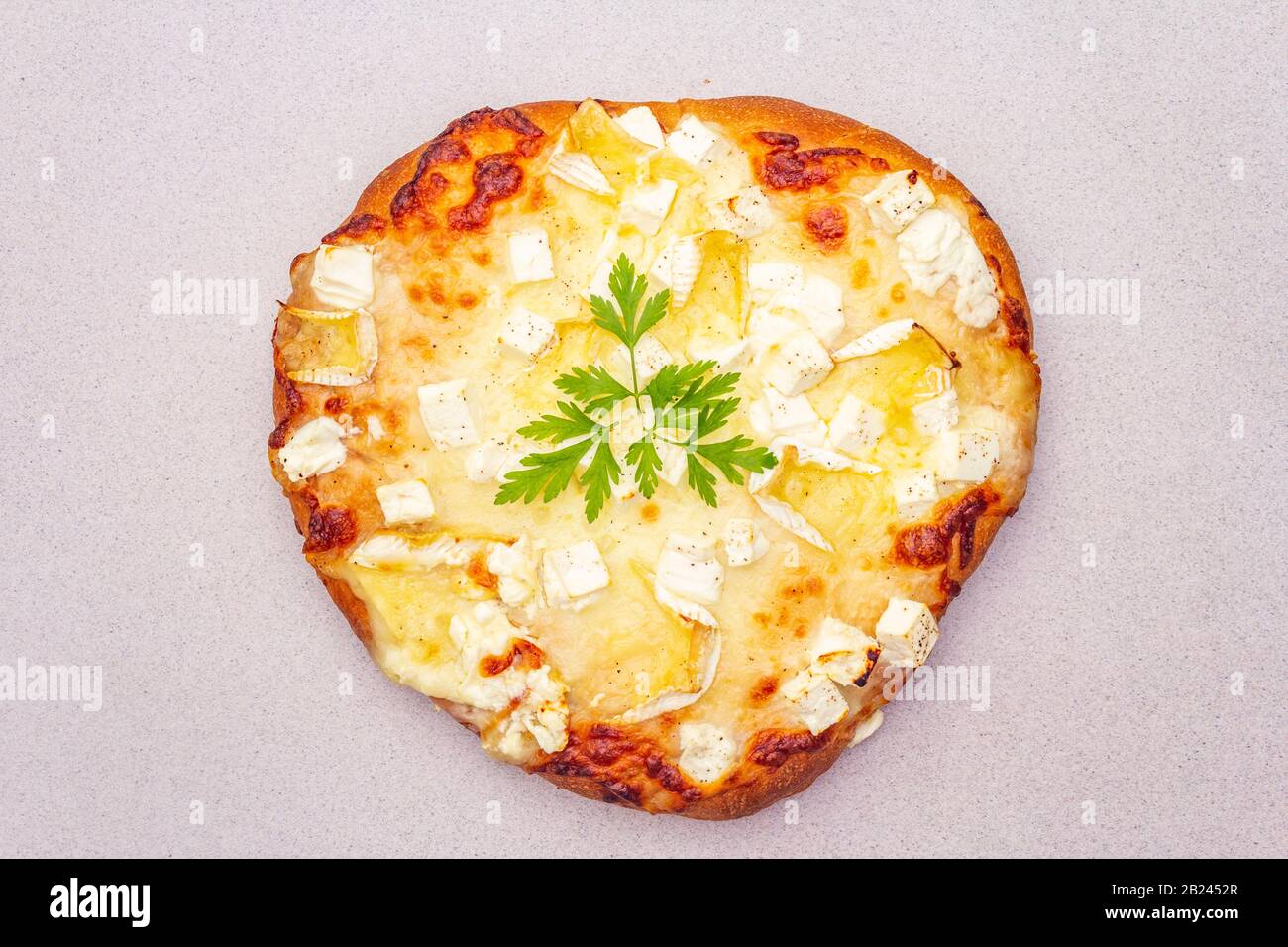Italian focaccia with three types of cheese and parsley. Traditional ...