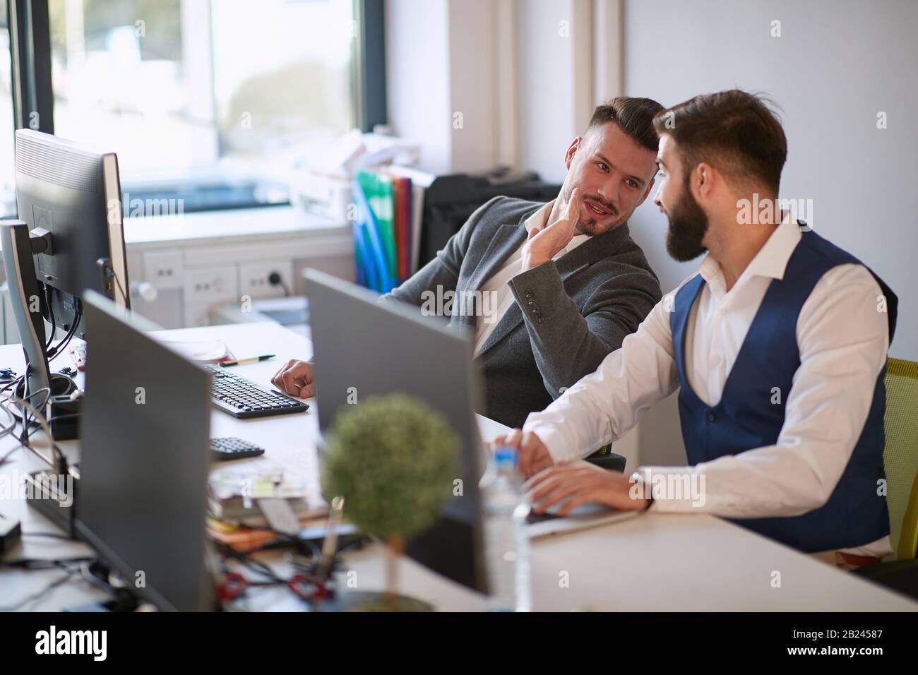 Diverse group smiling businessmen hi-res stock photography and images ...