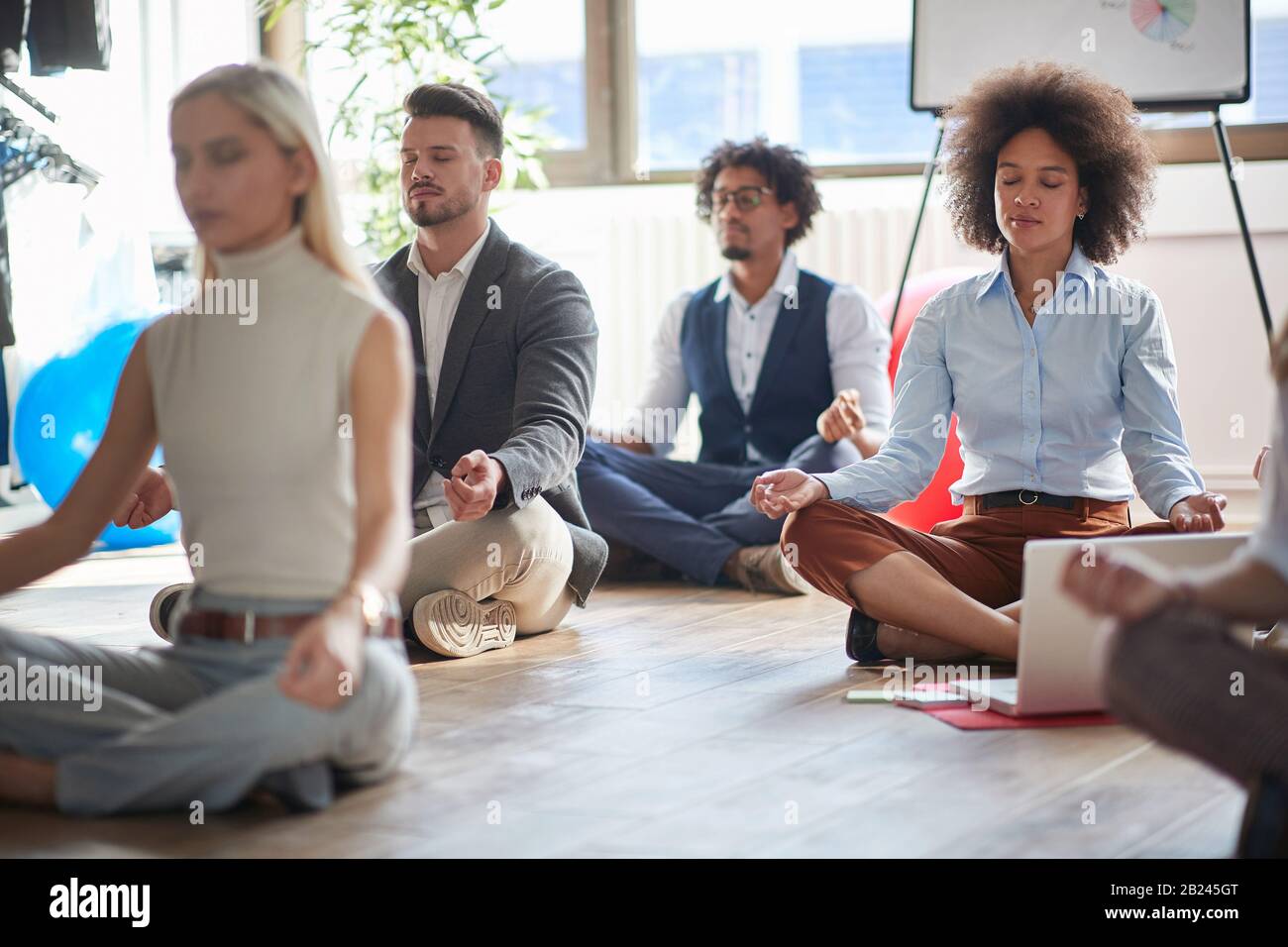Group meditation office hi-res stock photography and images - Alamy