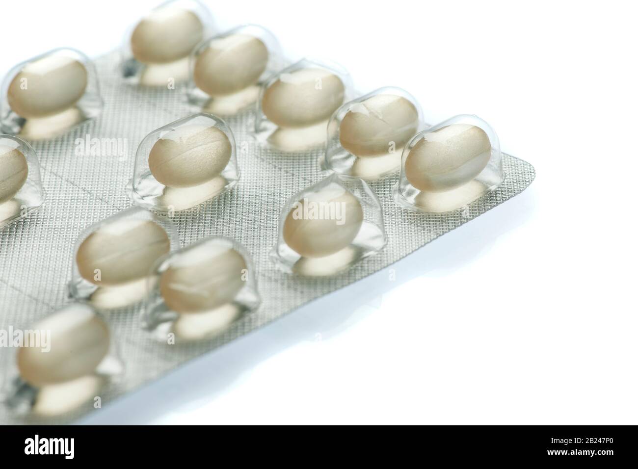 Close-up of a foil packaging, with sealed tablet coated tablets ...