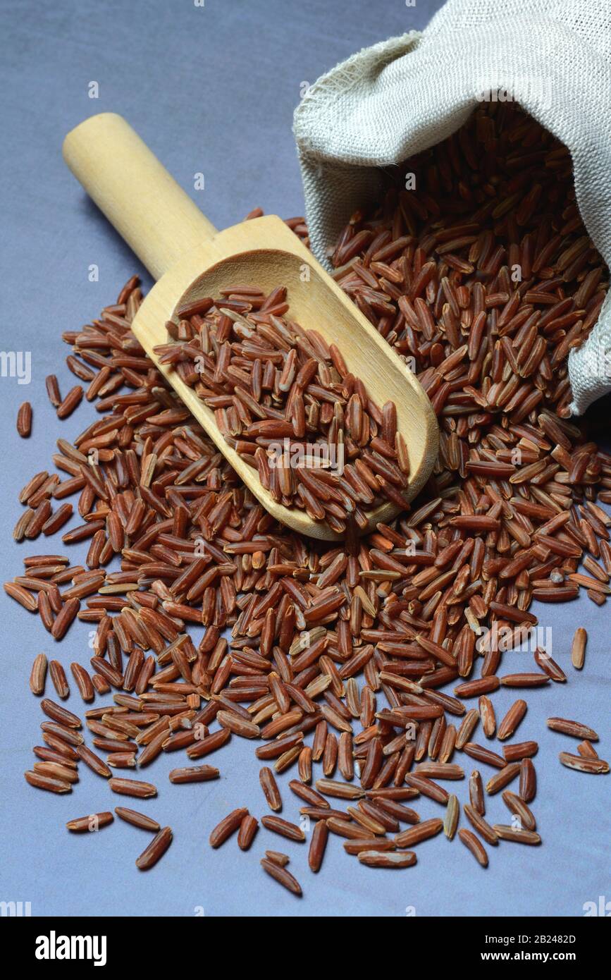 Red rice with wooden shovel, rice, Germany Stock Photo - Alamy