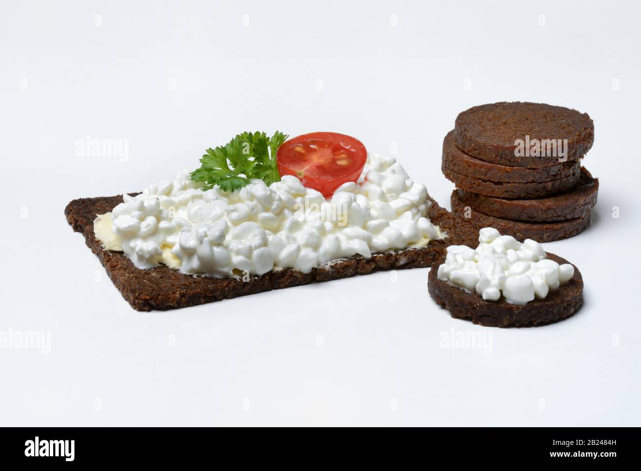 Pumpernickel slices topped with cream cheese, Germany Stock Photo - Alamy