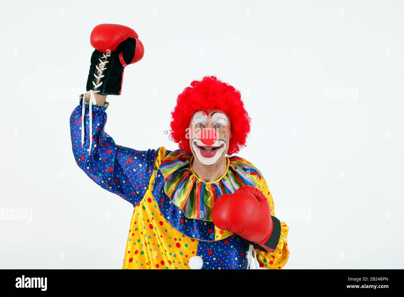 Clown in victory pose hi-res stock photography and images - Alamy
