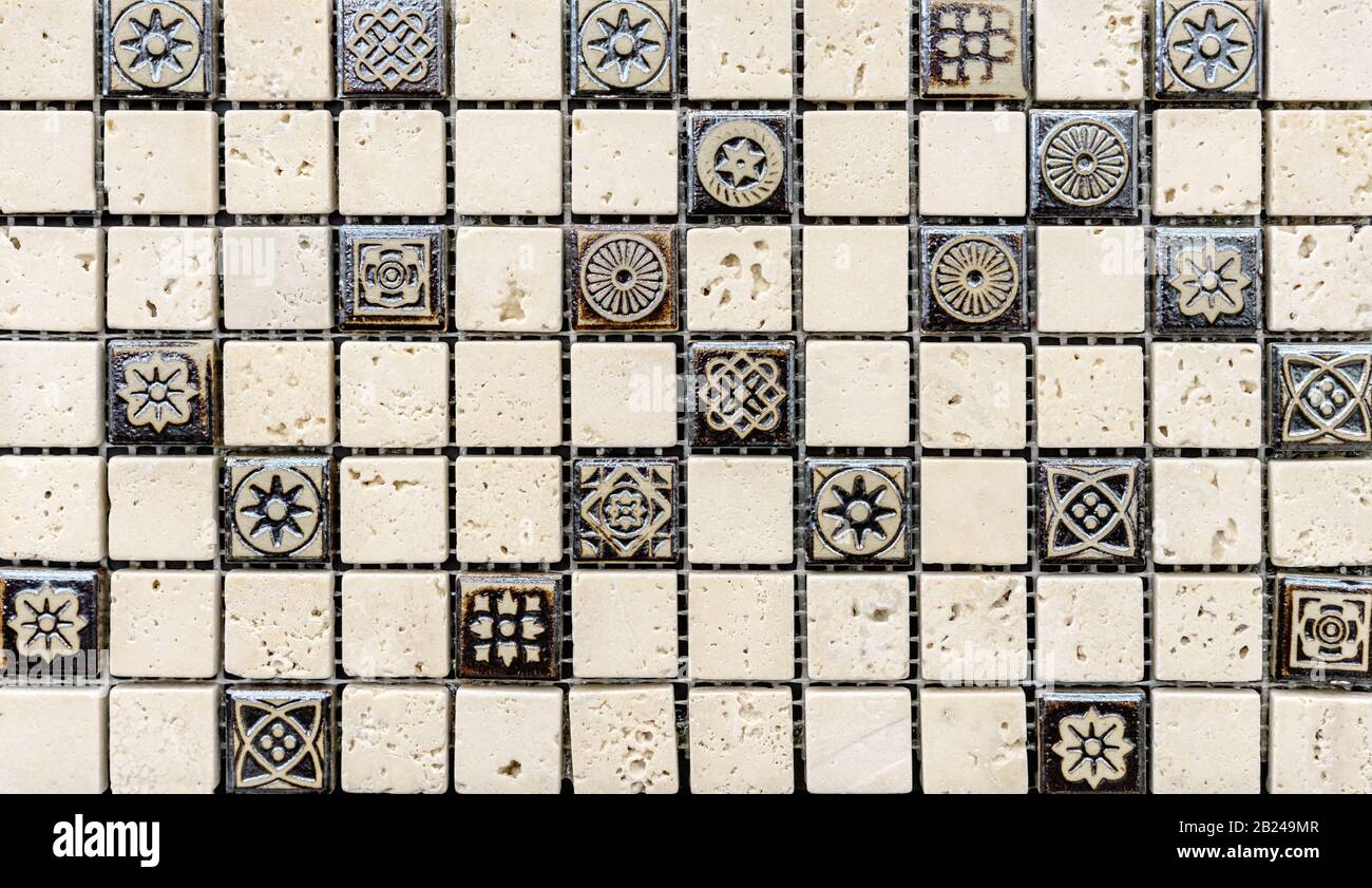 Beige quartz mosaic tiles with embossed patterns to decorate the ...