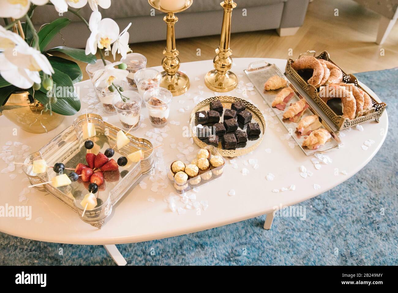 Snack table. Breakfast foods. Chocolate, fruit and croissant Stock ...