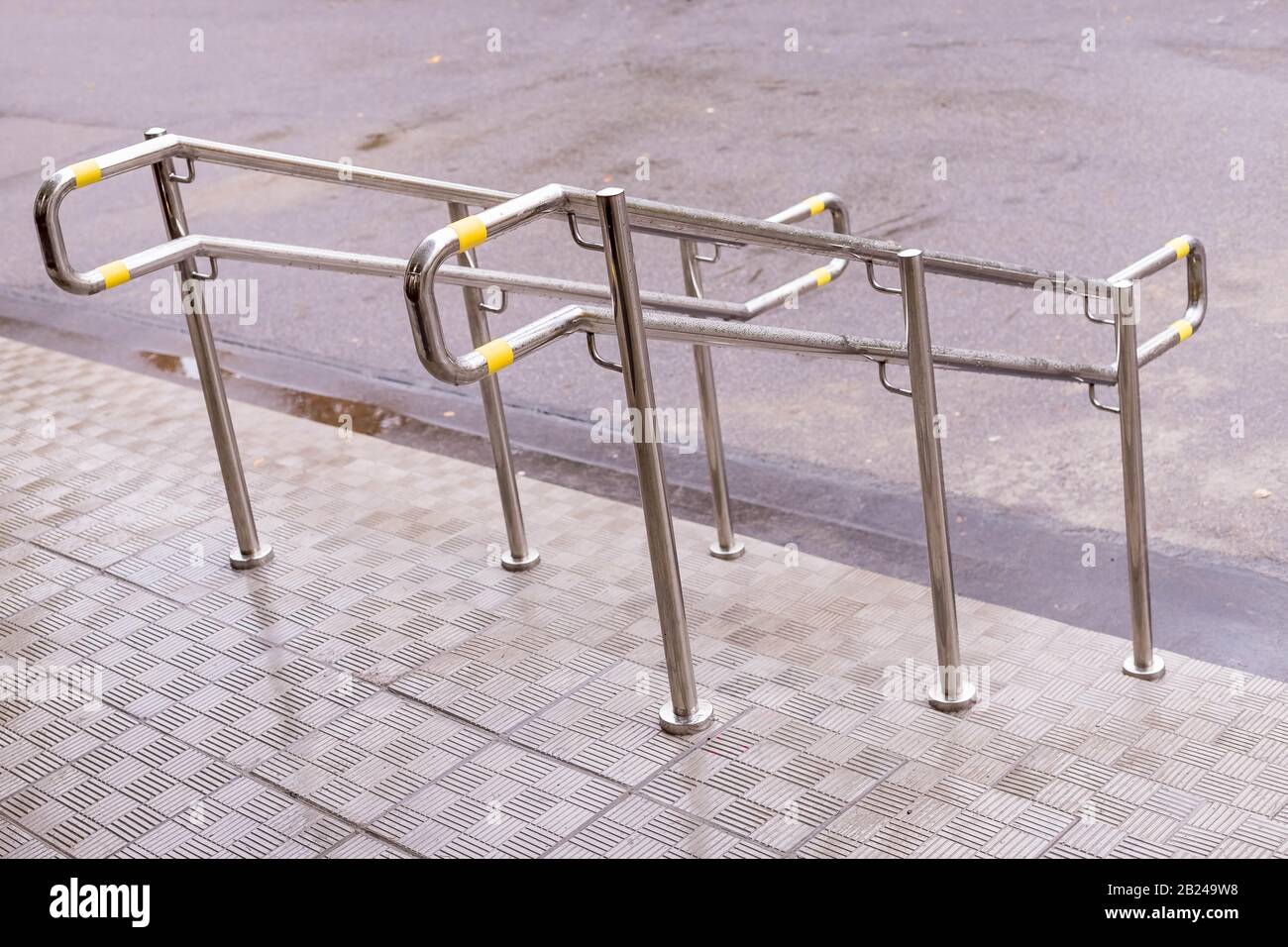 Stainless steel handrails are installed on the teps.safe movement ...