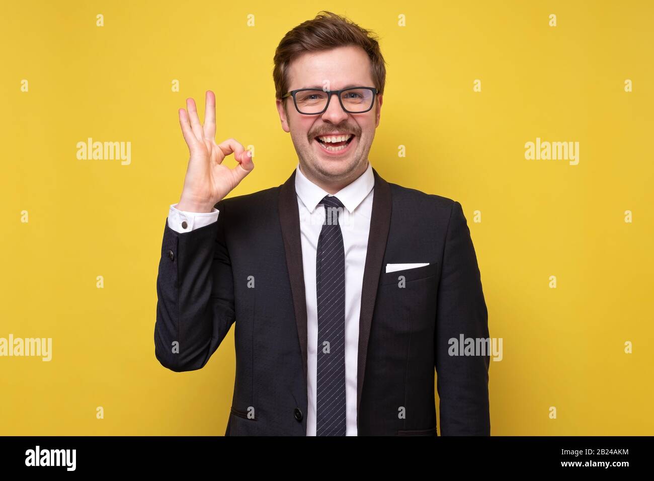 Everything is OK concept. Happy young man with mustache in shirt and ...