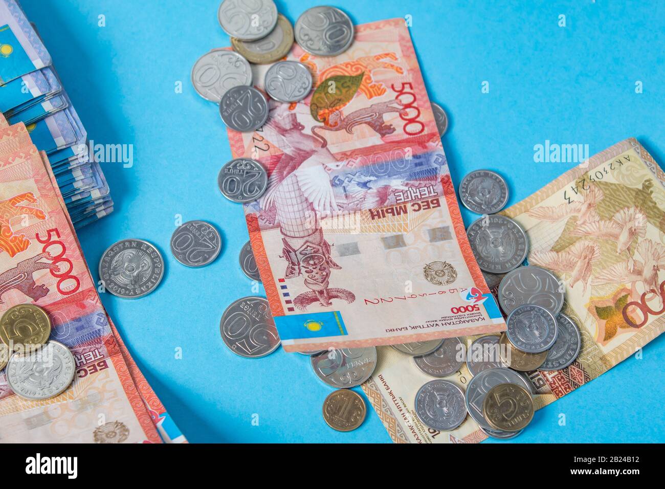Tenge on a blue background. Banknotes tenge. Money Kazakhstan Tenge ...
