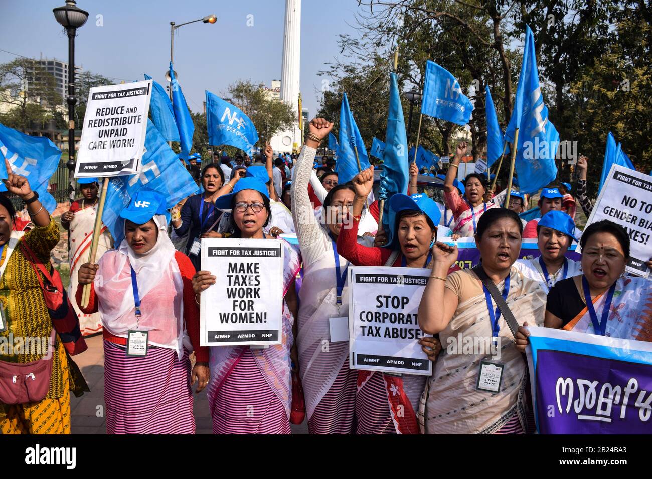 Protesters chant slogans while holding placards and flags during the ...