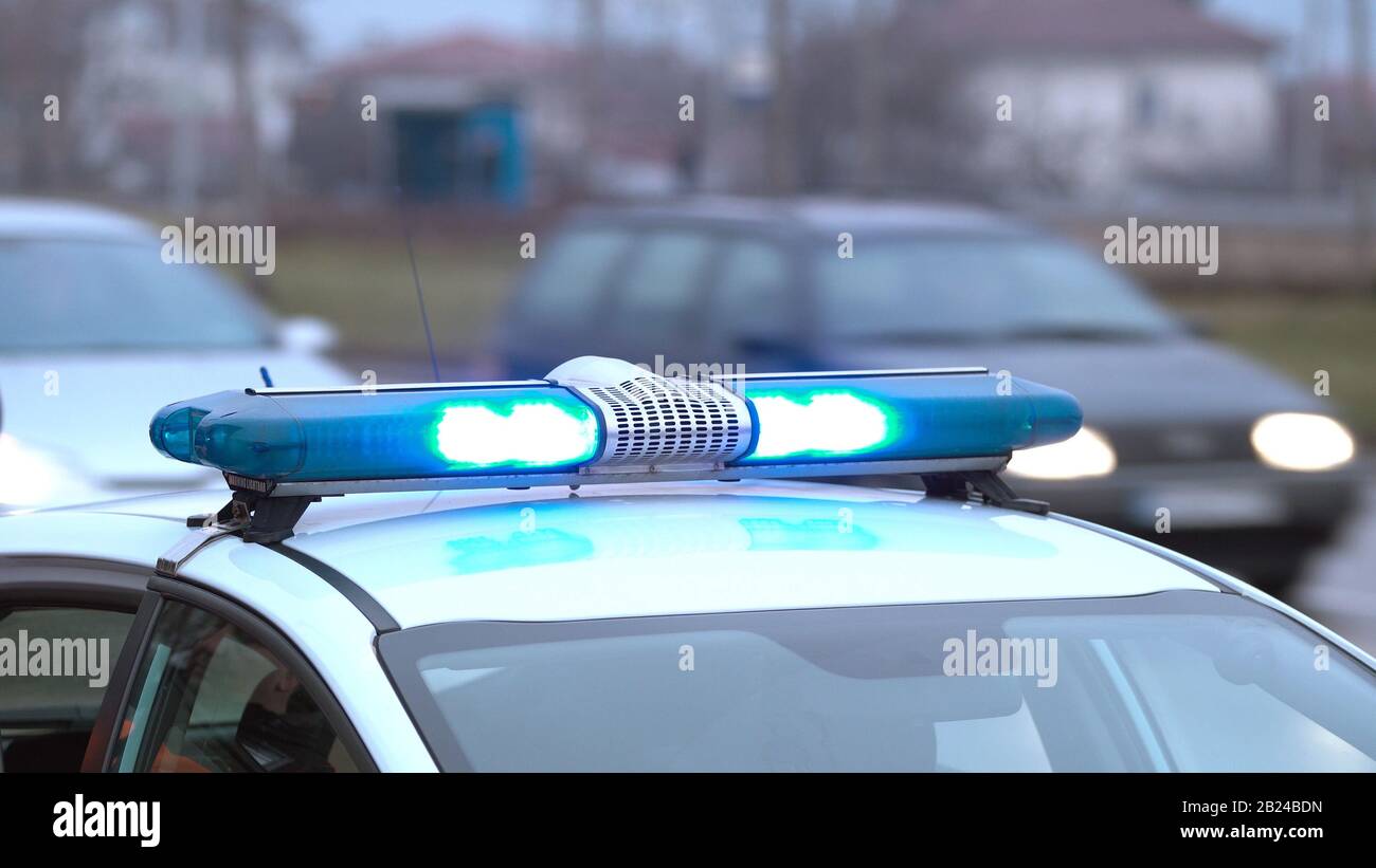 Police warning lights are seen on a police vehicle on the road Stock ...