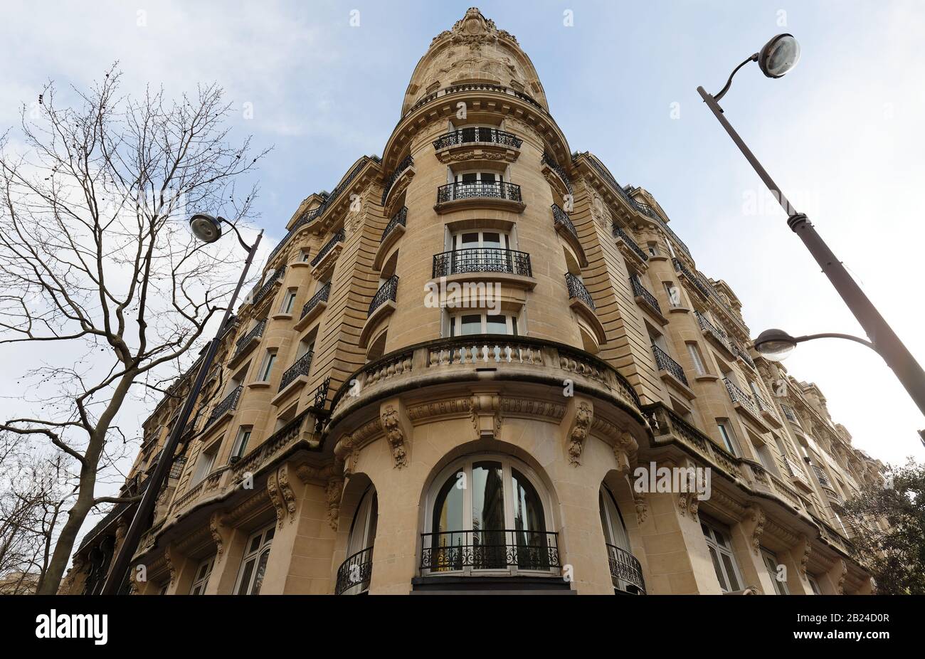 Traditional French house with typical balconies and windows. Paris ...