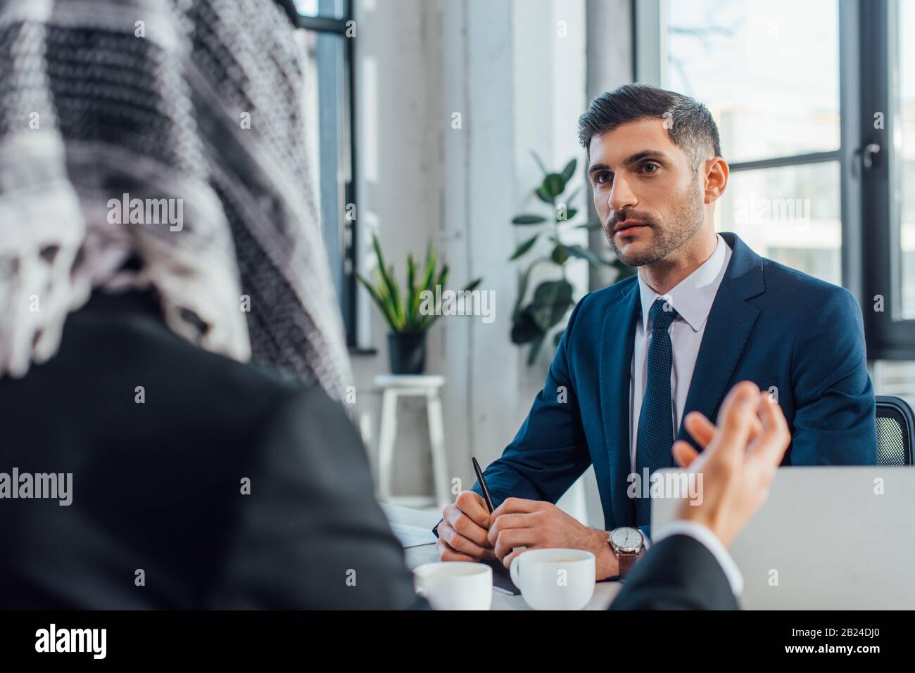 Two arab men talking hi-res stock photography and images - Alamy