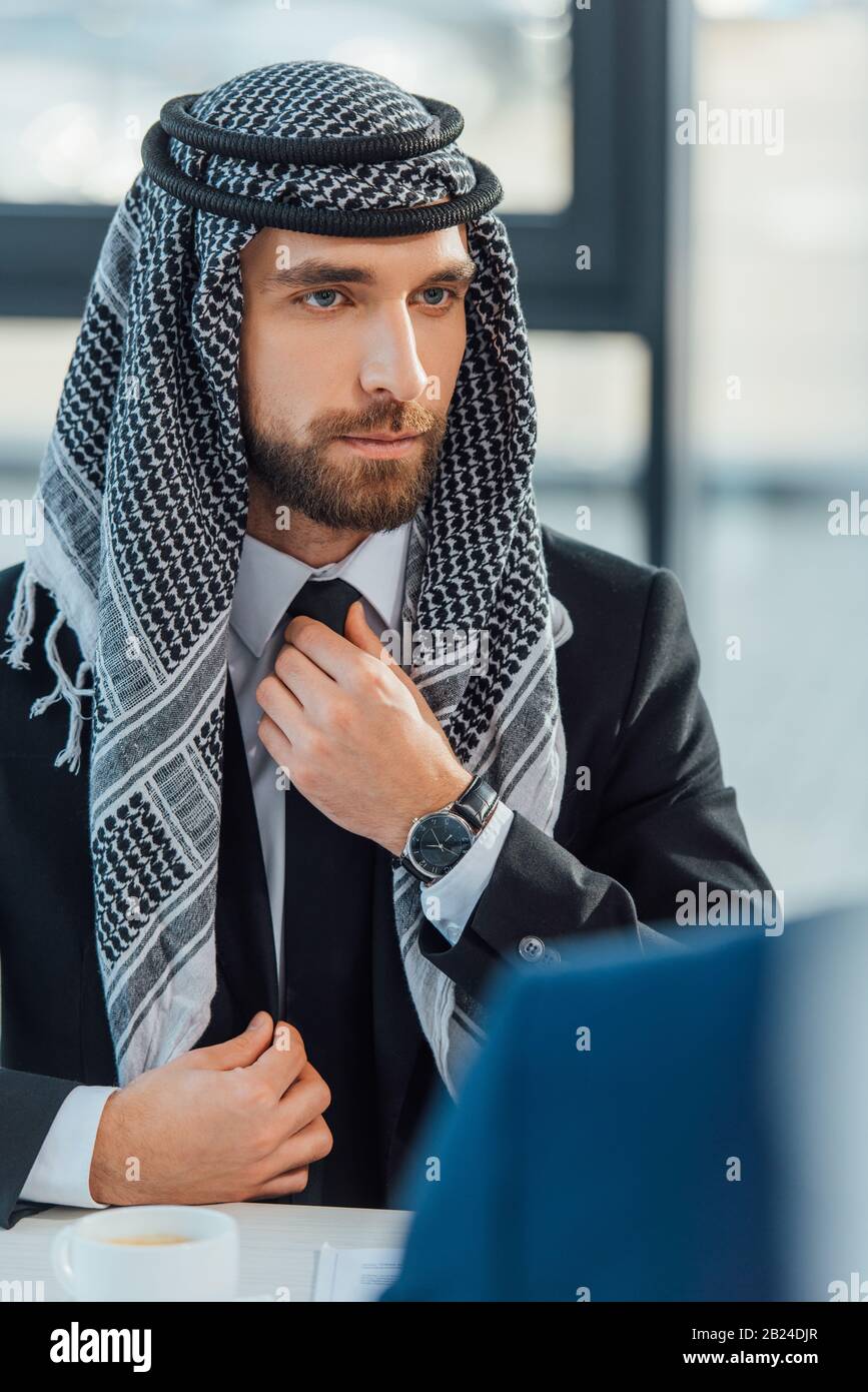 arabic businessman talking with partner in modern office Stock Photo ...