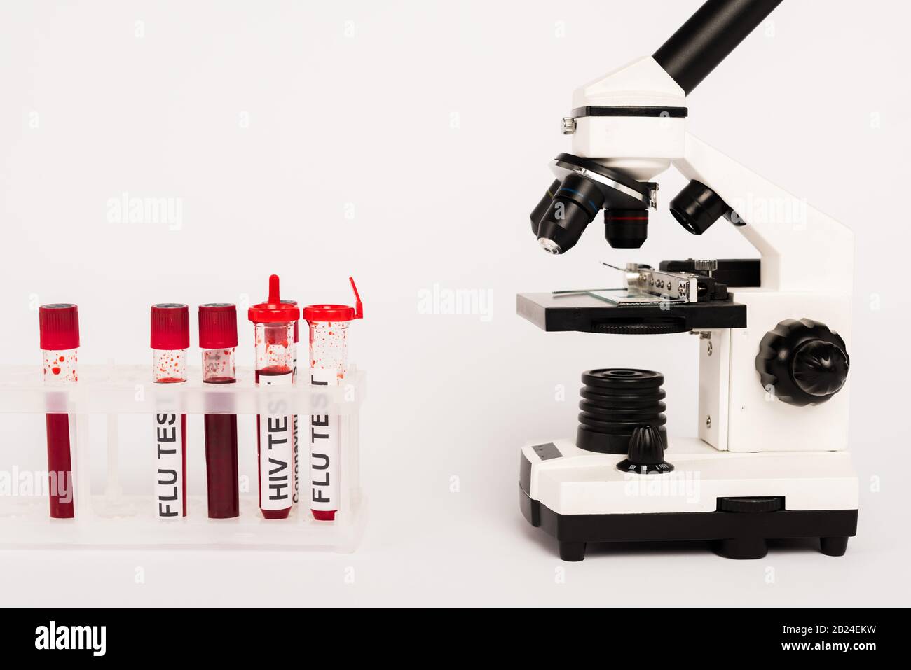microscope and samples with lettering on white Stock Photo - Alamy